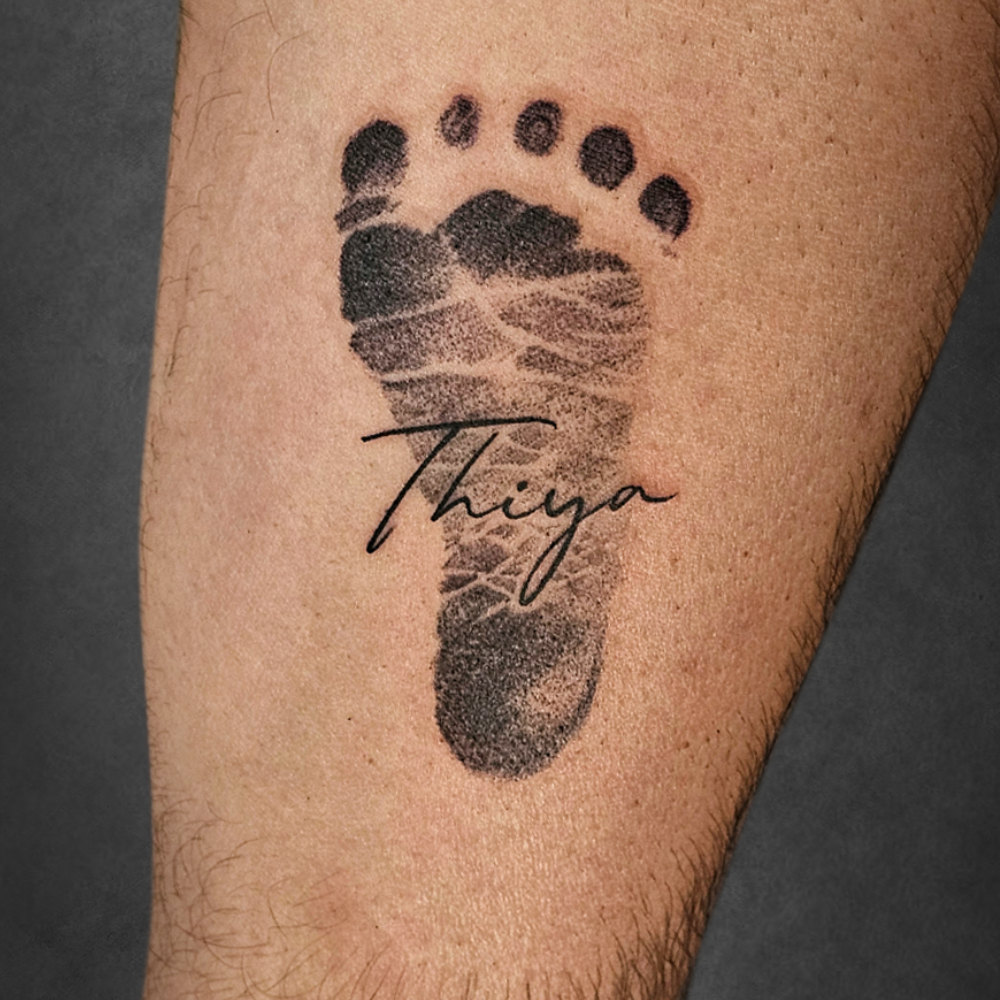 Footprint tattoo with name | Orangetattooshop.com